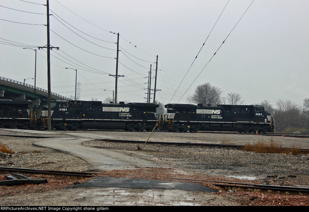 NS 8983 leads WB 224 out of the trra yard.